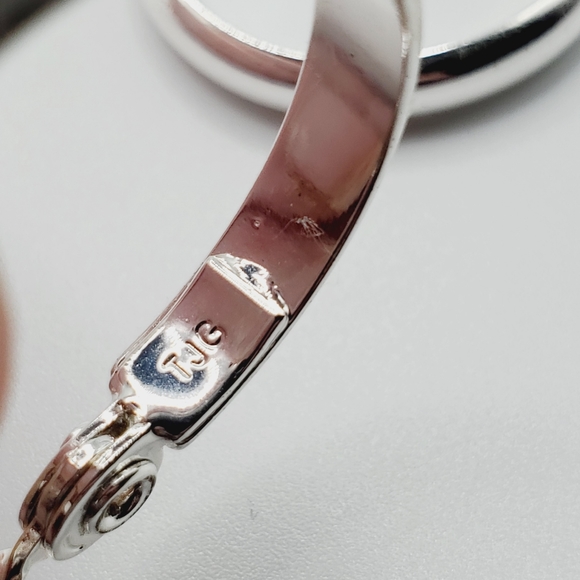 TJG | Jewelry | Vintage Tjg Silver Hoops Clip On 8s 90s Euc Signed ...